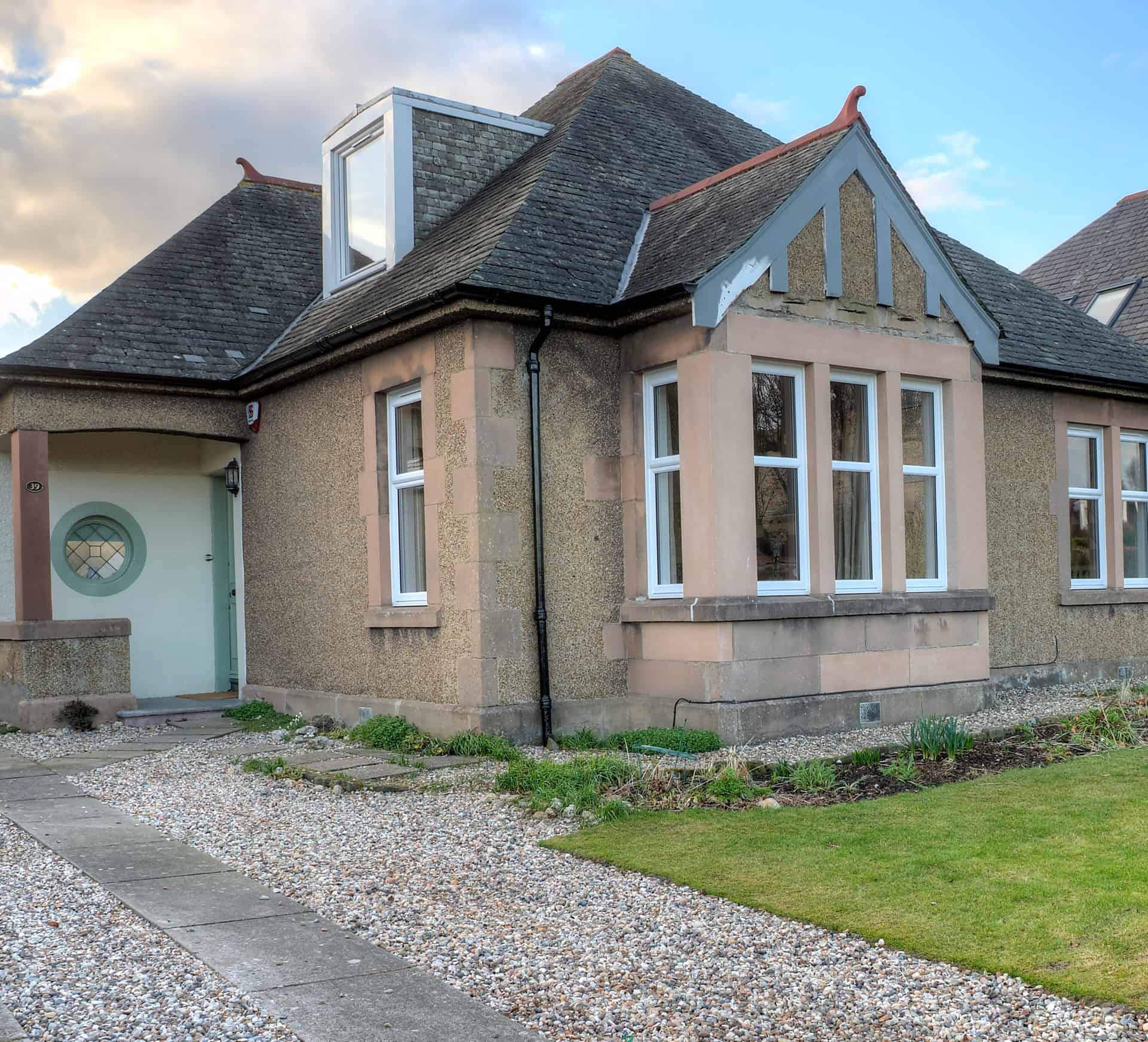 New white Lorimer casement windows gives fresh new appearance - CR Smith