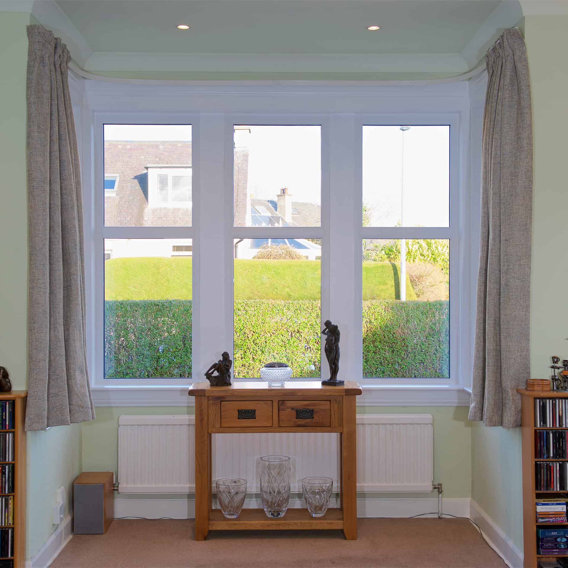 New white Lorimer casement windows gives fresh new appearance - CR Smith